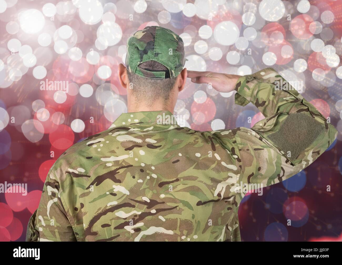 Military saluting against glowing background Stock Photo - Alamy