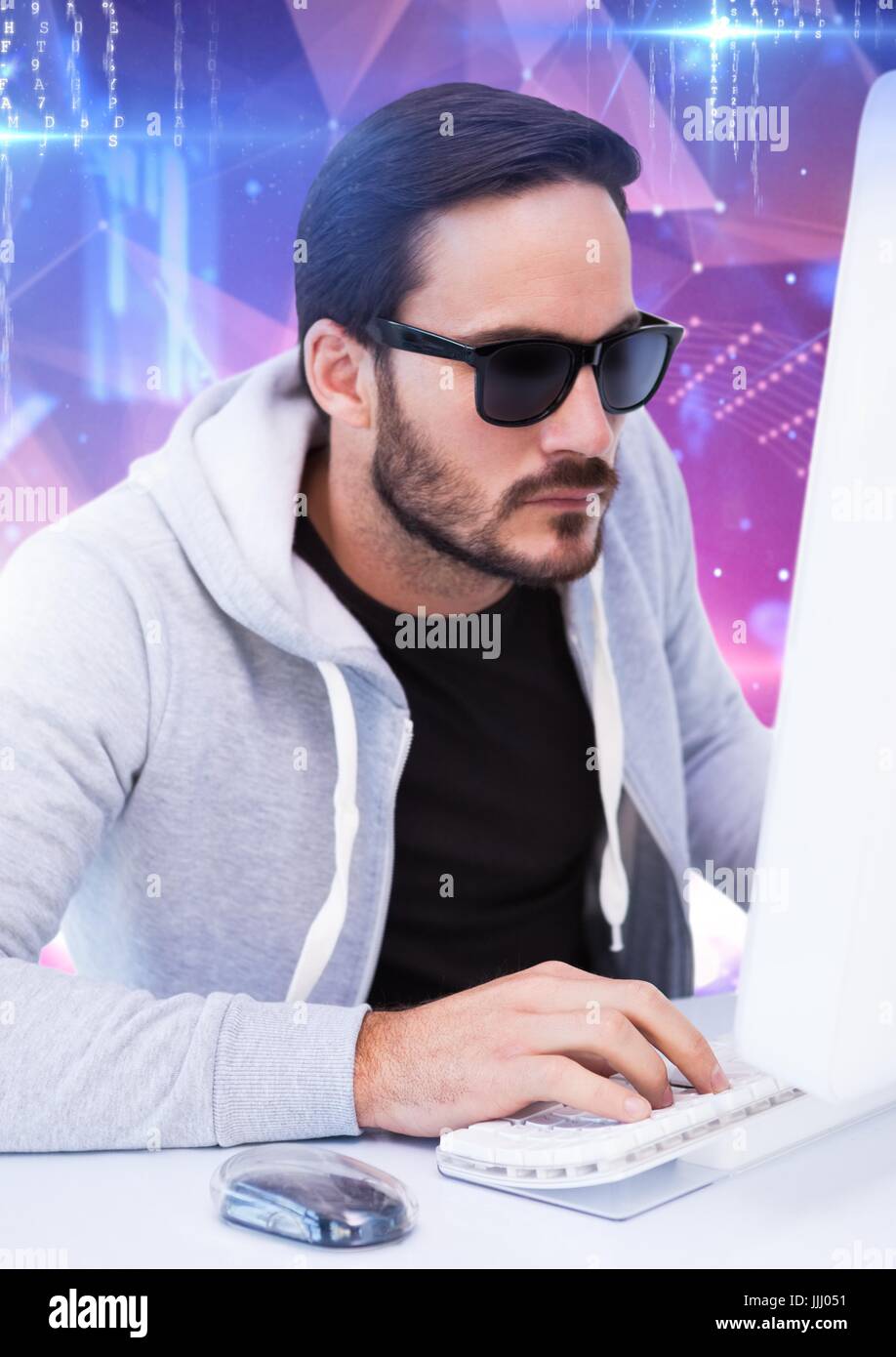 hacker with sunglasses typing on a keyboard in front of digital ...