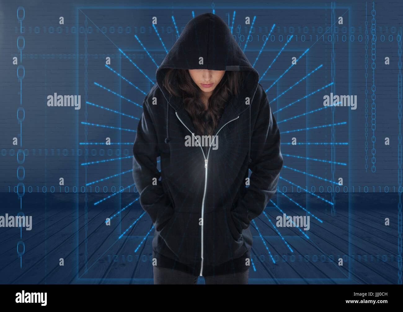 Woman hacker with hands in pocket in front of digital blue background ...