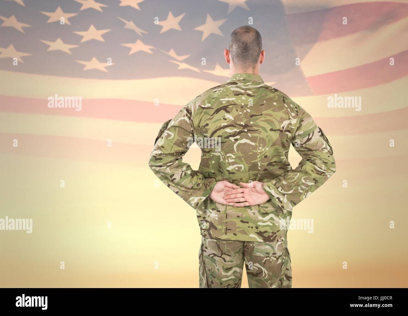 Soldier from back with hands on the back against american flag Stock ...