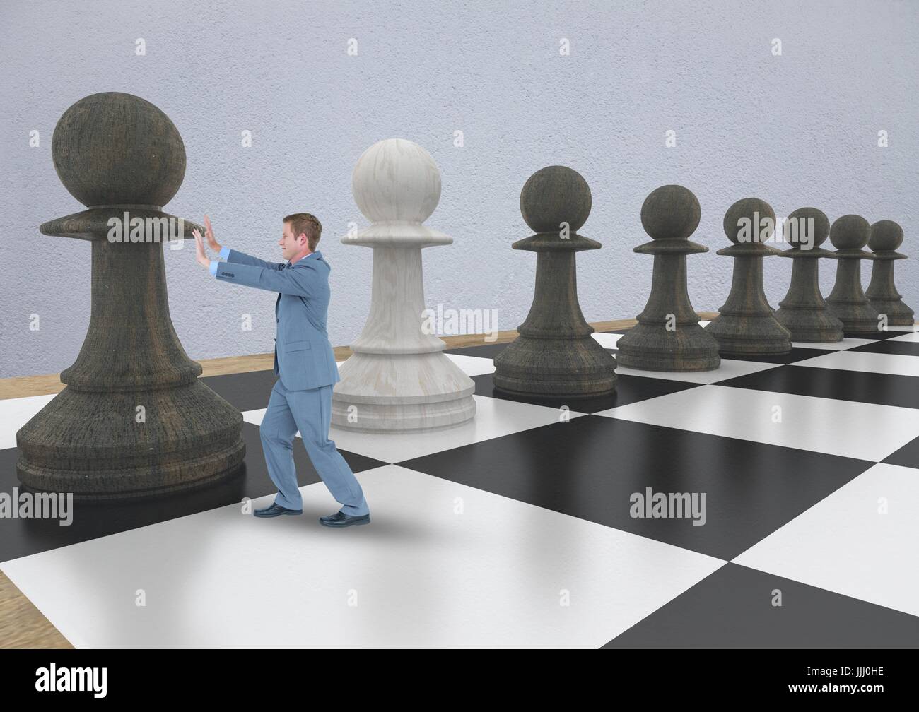 Business man pushing 3D chess piece against grey wall Stock Photo - Alamy