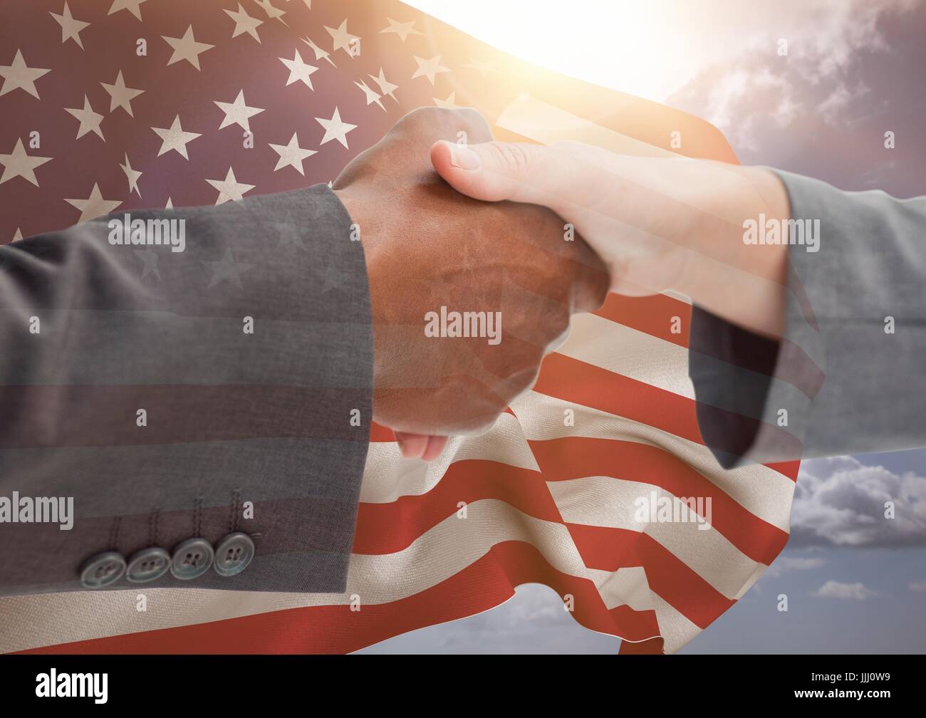 people shaking their hands against american flag Stock Photo - Alamy