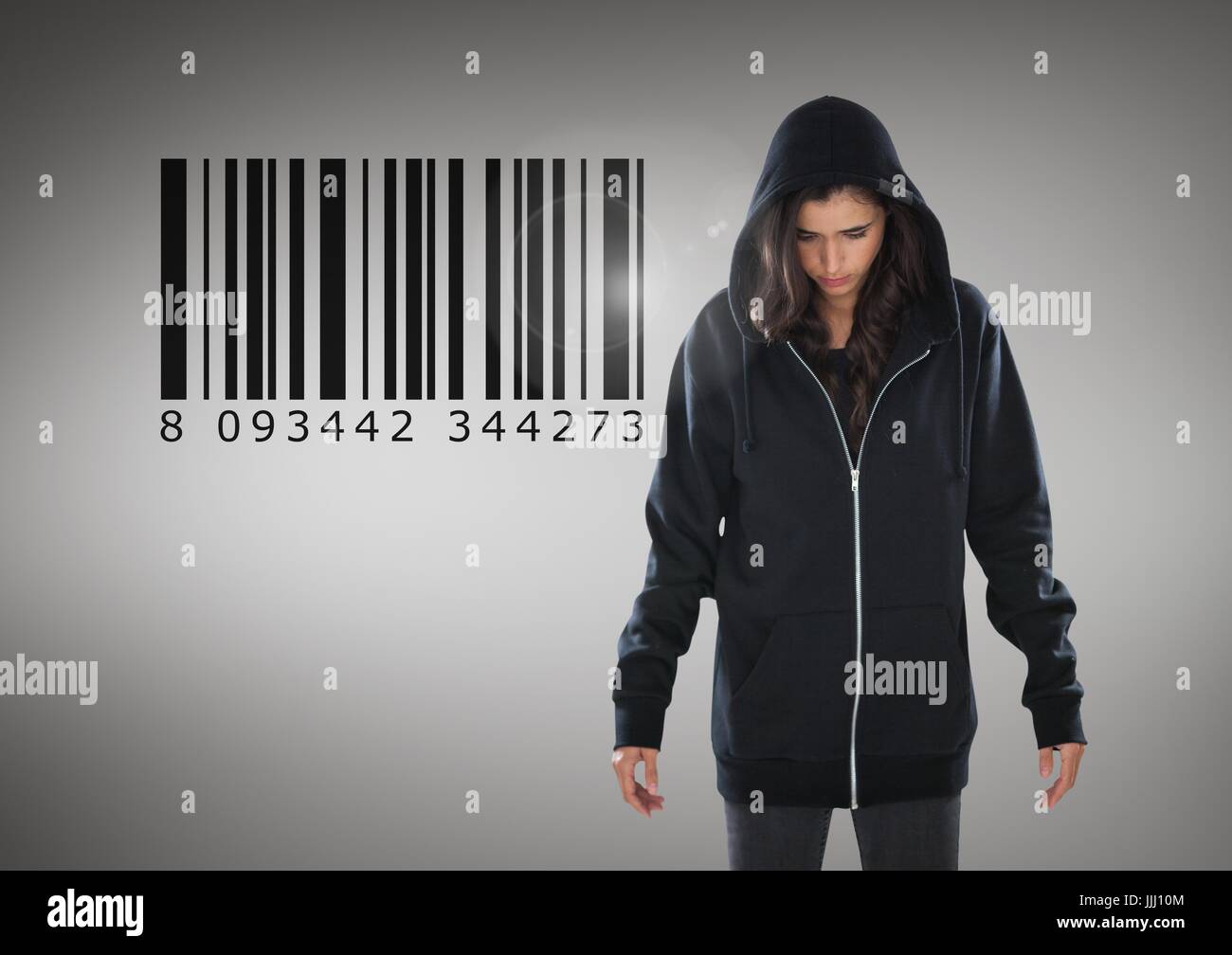 Woman hacker in front of grey background with bar code Stock Photo - Alamy