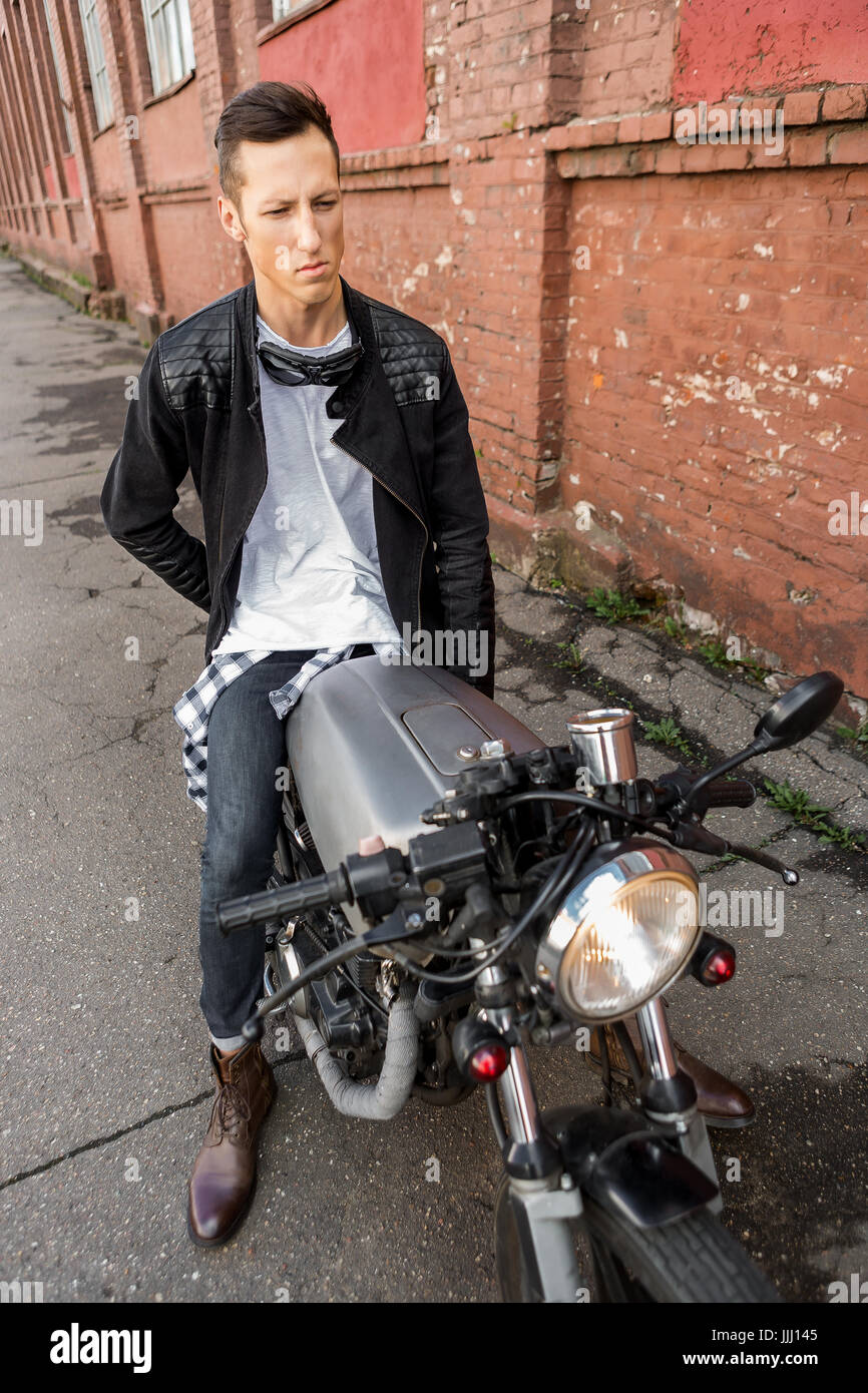 Handsome rider biker man in black leather jacket and protection ...