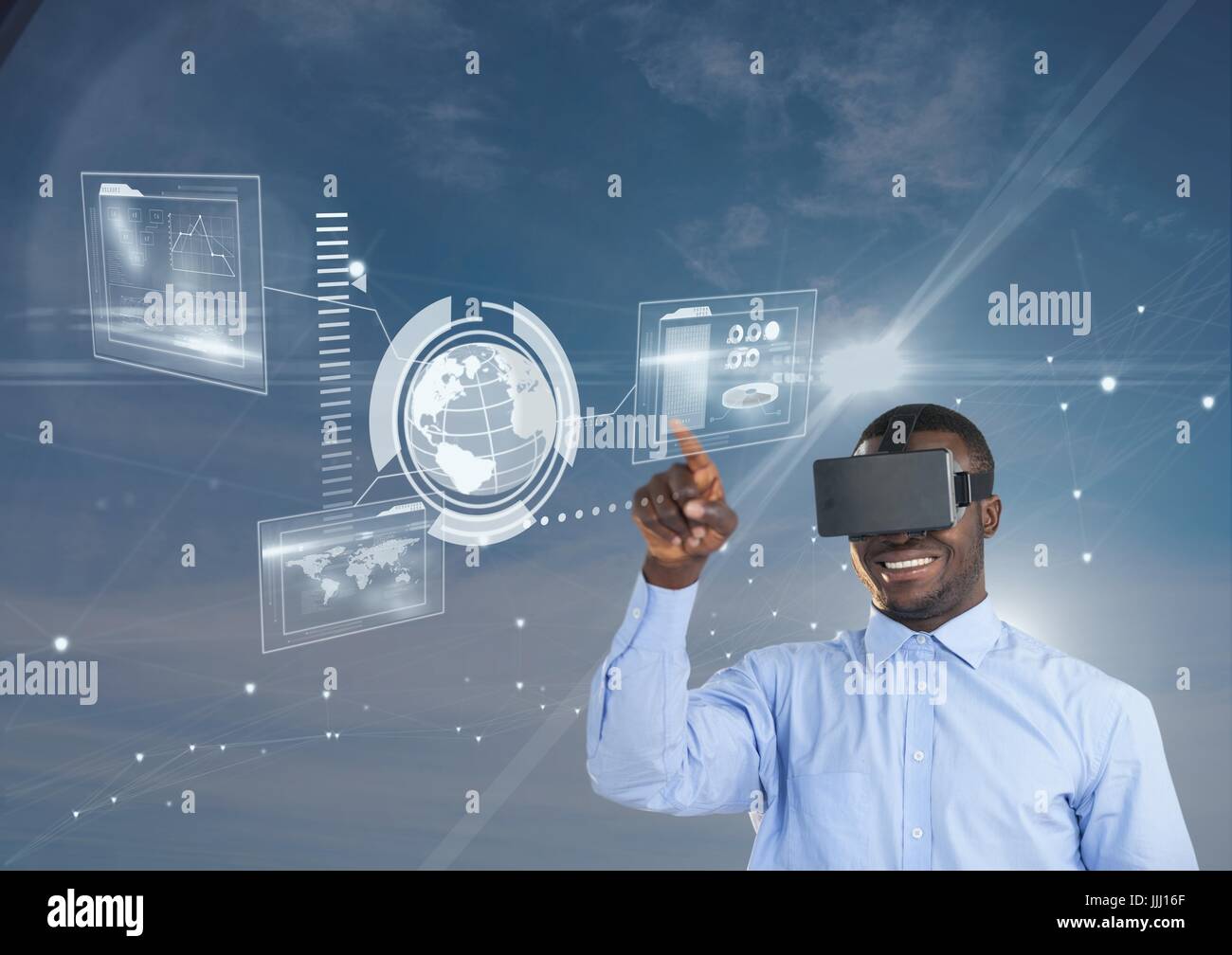 Happy man in VR headset touching interface against blue sky with flares ...