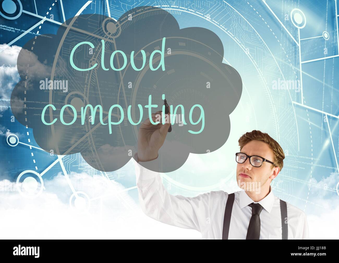 Young man writing in the screen CLOUD COMPUTING inside a cloud ...