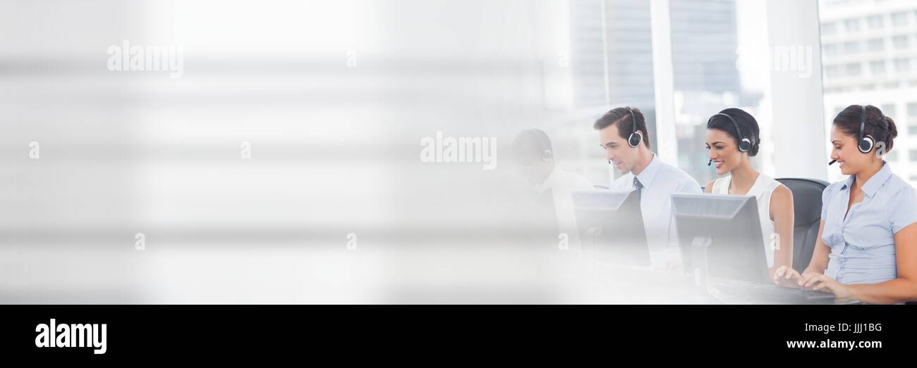 Customer service assistants with headsets with bright office background ...