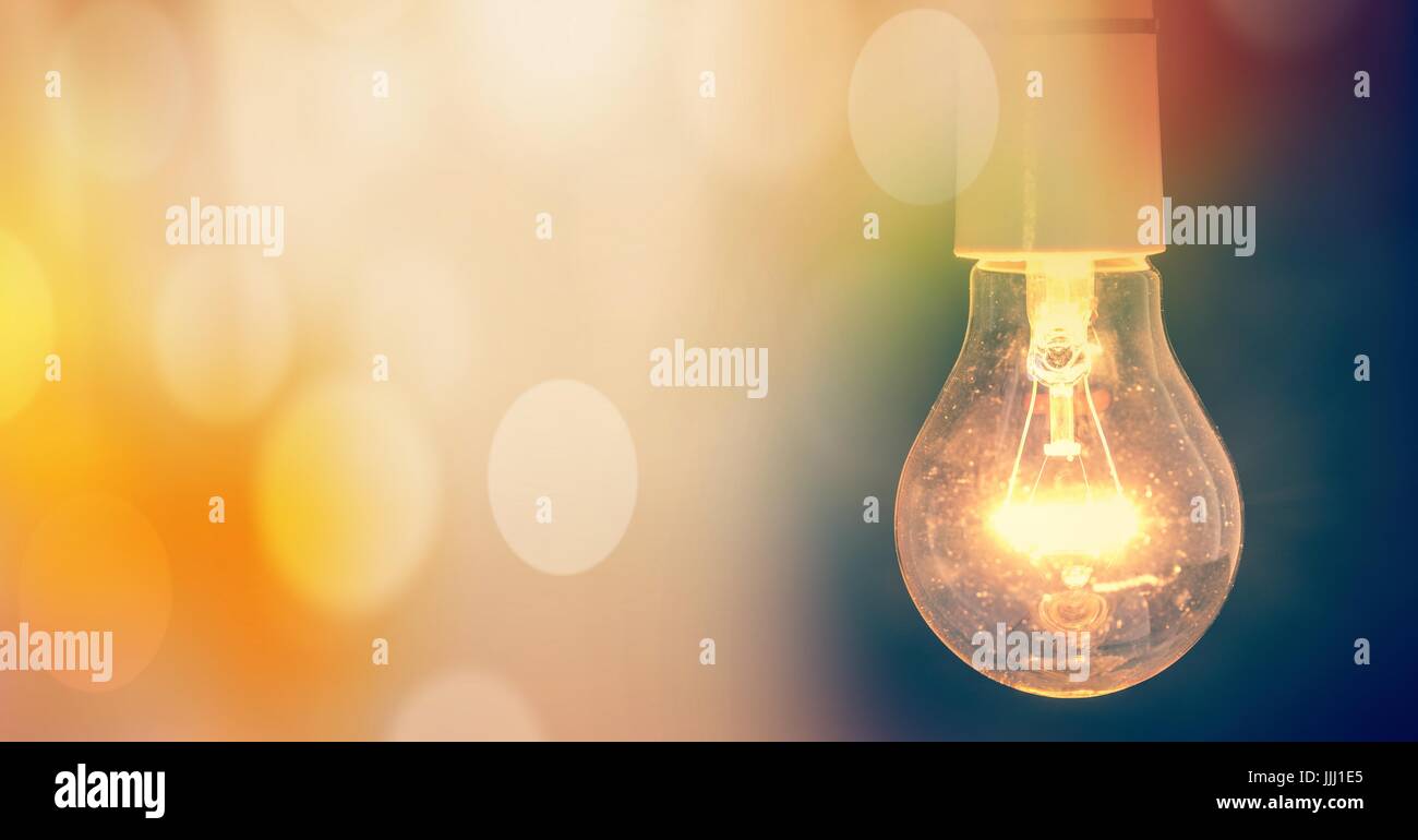 Light bulb with navy background and orange bokeh transition 3d Stock ...