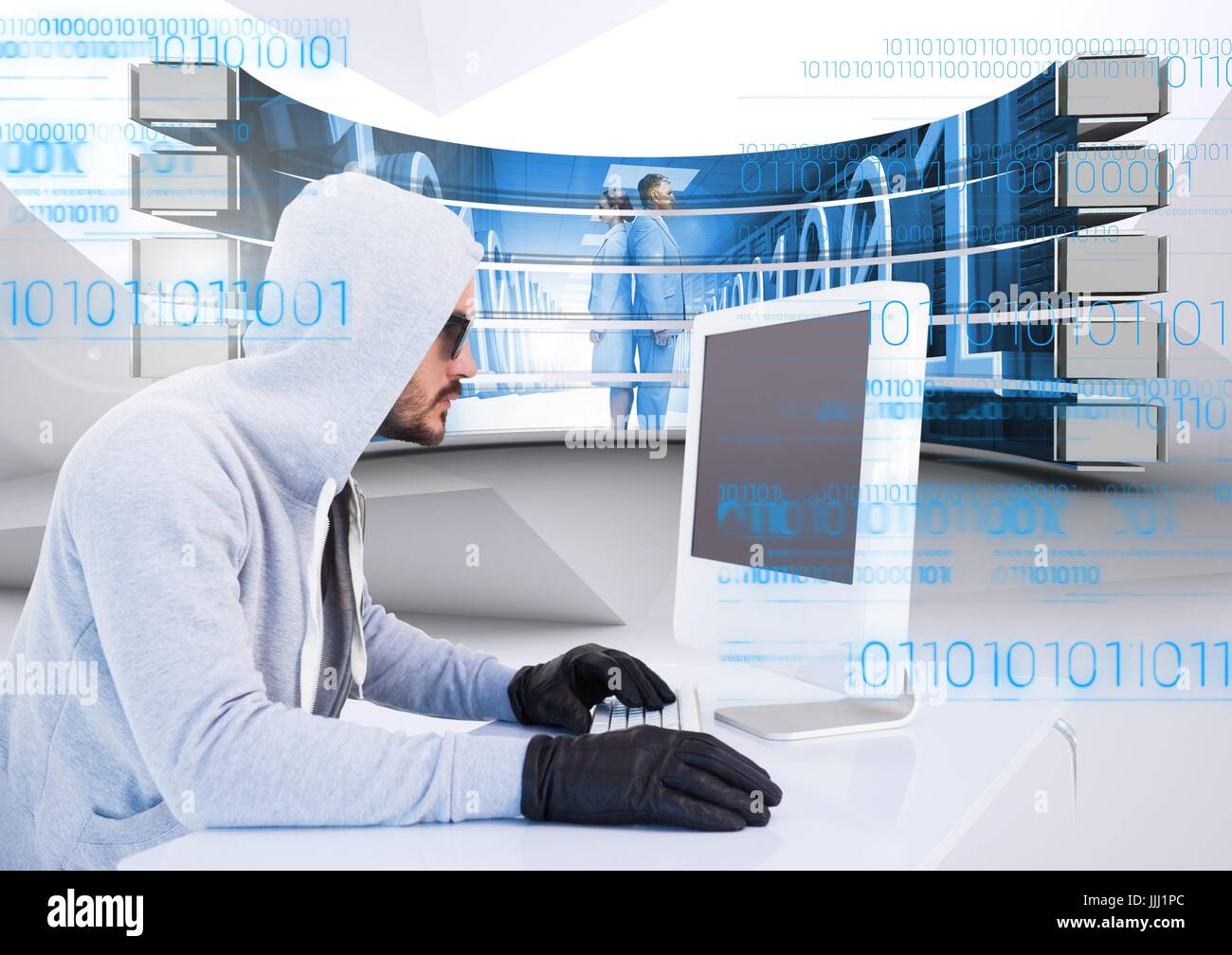 Hacker using a laptop in a data center Stock Photo - Alamy