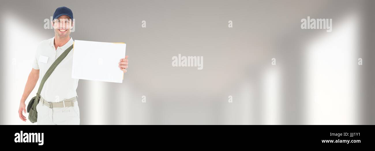 Delivery Courier holding blank sign in front of blurred background ...