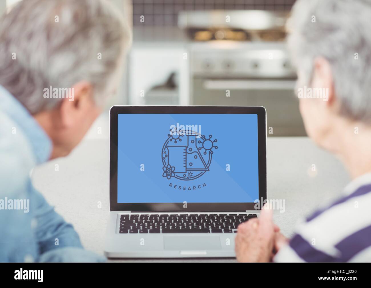 People looking at a computer with education icon on the screen Stock ...