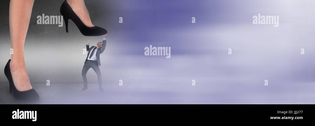 Business man being stepped on by giant feet with blurry purple ...
