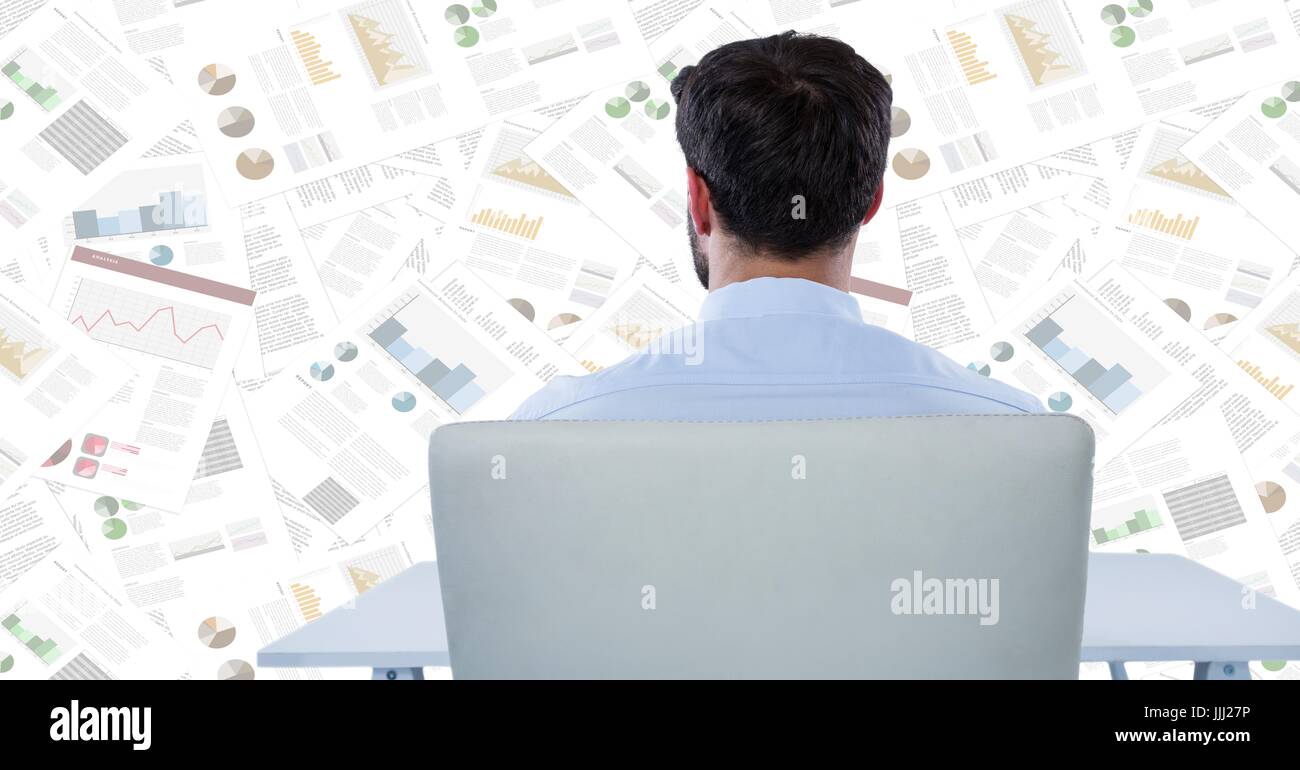 Back of business man at desk against document backdrop Stock Photo - Alamy