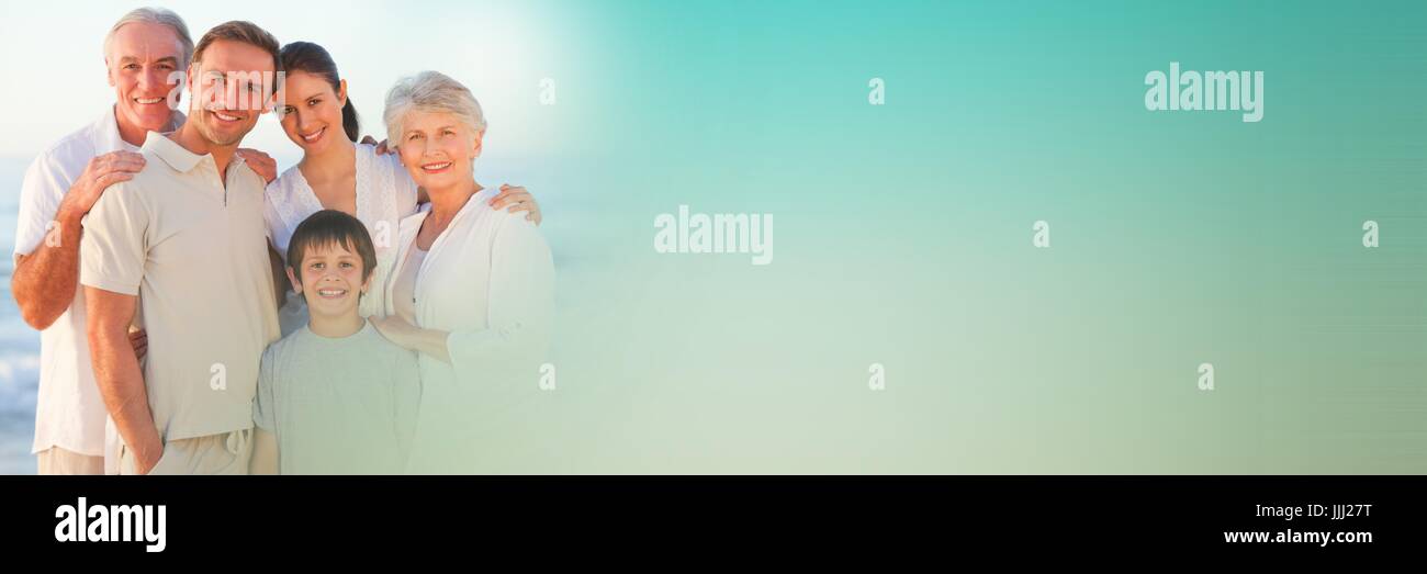 Family at beach with green transition Stock Photo - Alamy