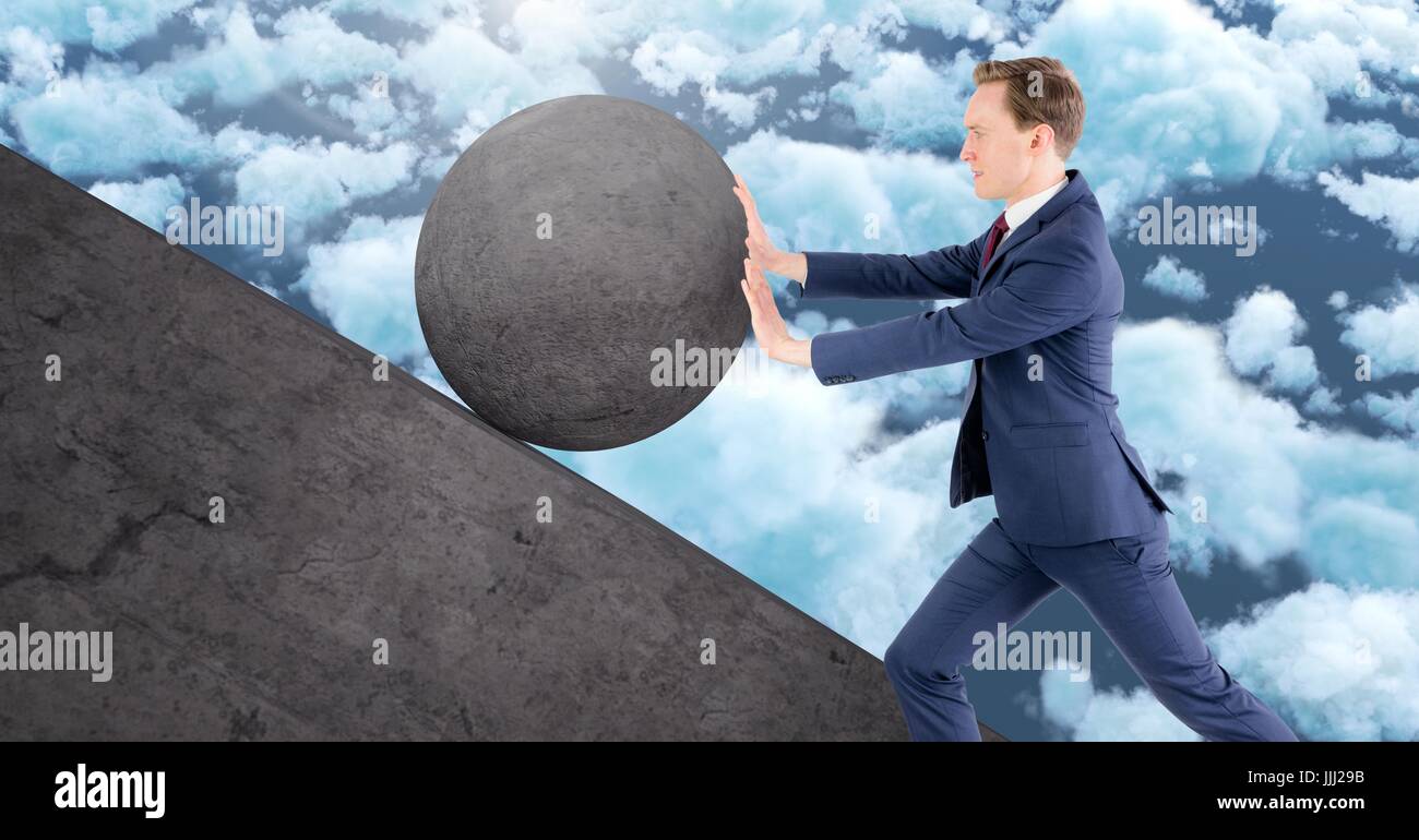 Man pushing rolling round rock Stock Photo - Alamy