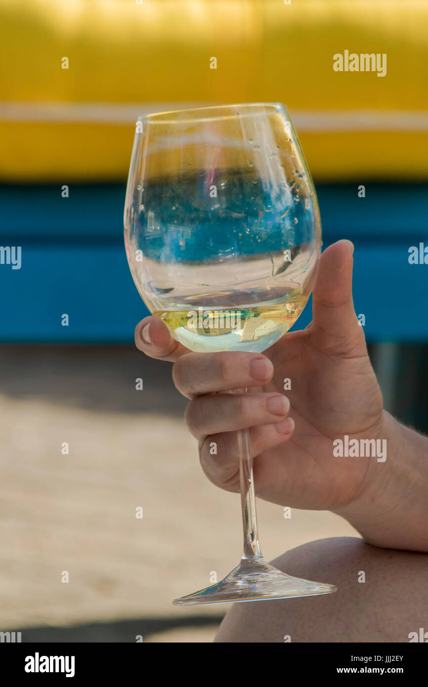 Close up of a hand holding wine glass Stock Photo - Alamy