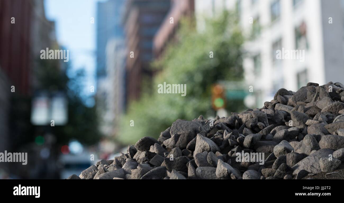 Rubble stones in pile with cityscape Stock Photo - Alamy
