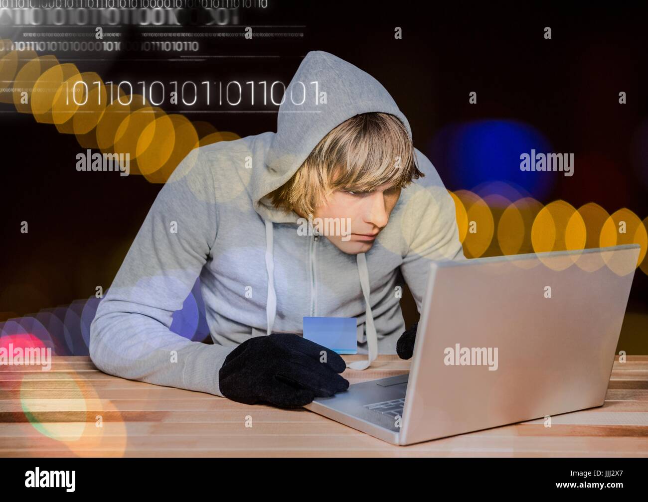 3d Blond hair hacker using a laptop Stock Photo - Alamy
