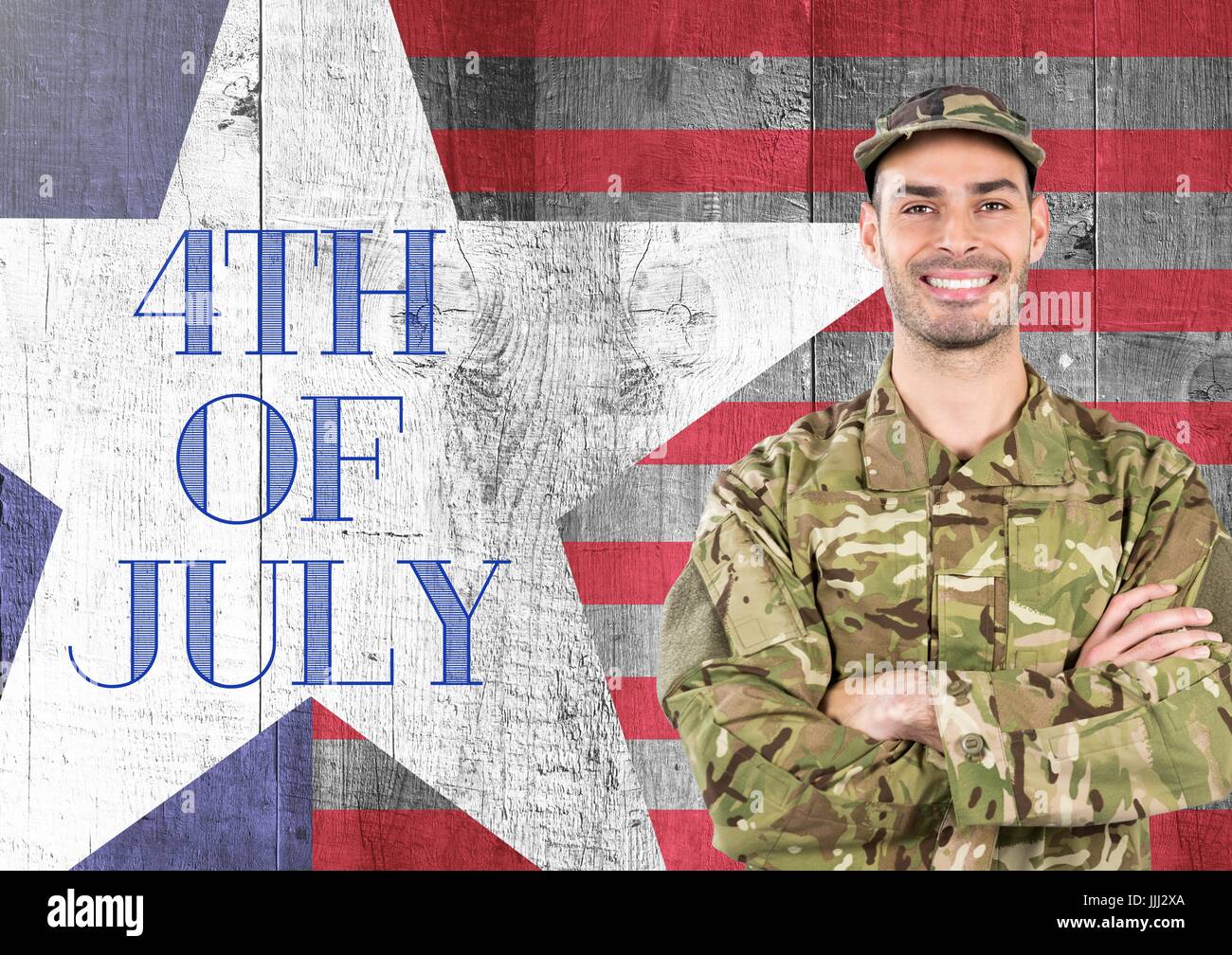 Smiling soldier standing on american flag background Stock Photo - Alamy