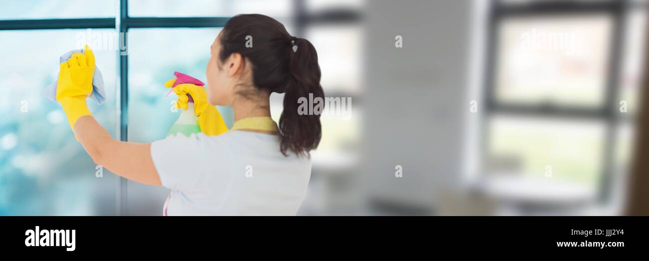 Cleaner of windows with bright background Stock Photo - Alamy