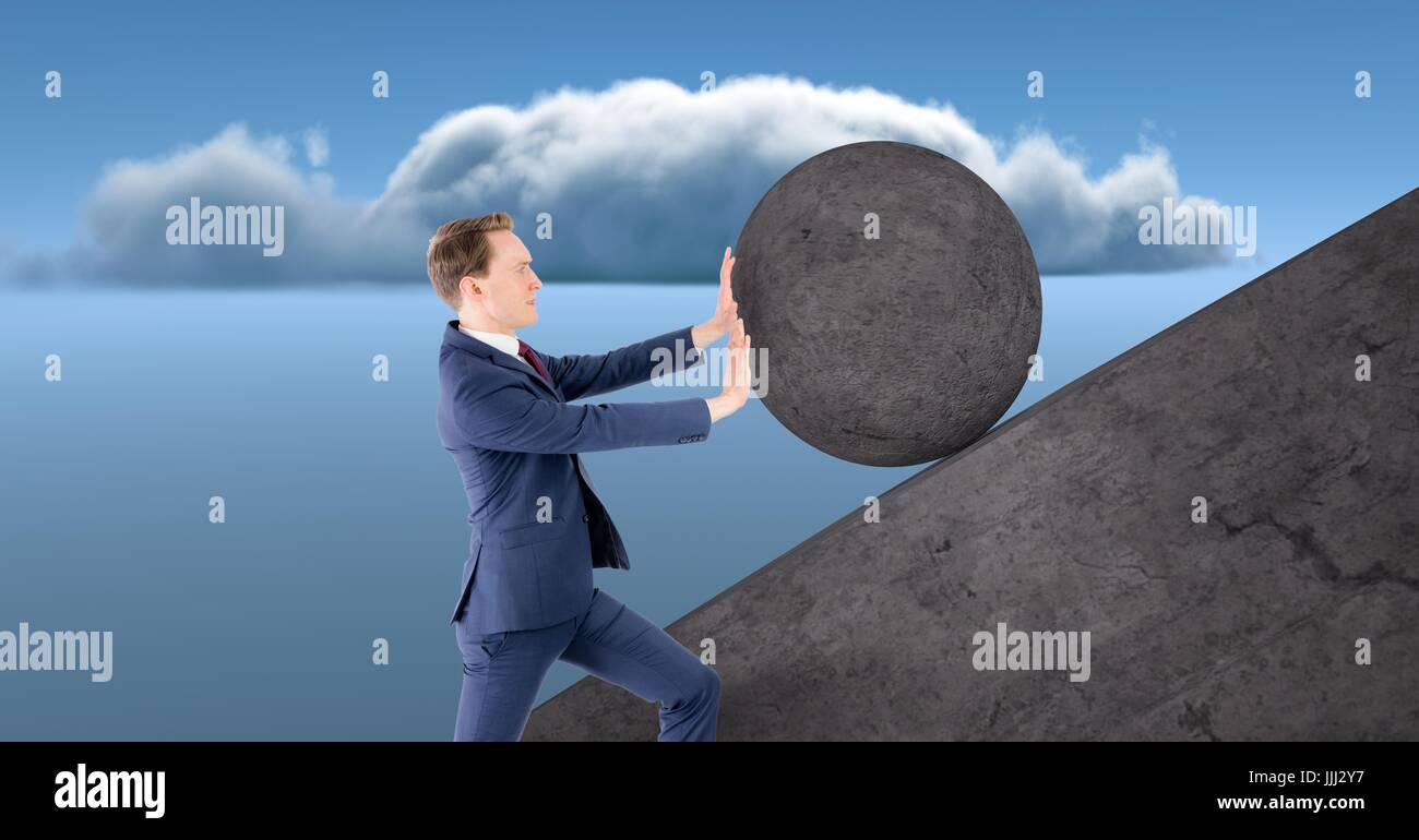 Man pushing rolling round rock Stock Photo - Alamy