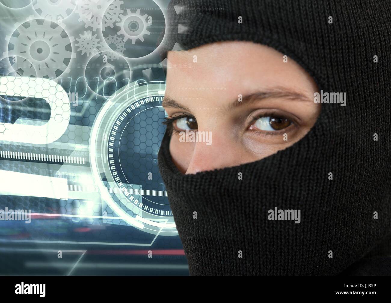 Woman hacker wearing an hood in front of digital background Stock Photo ...