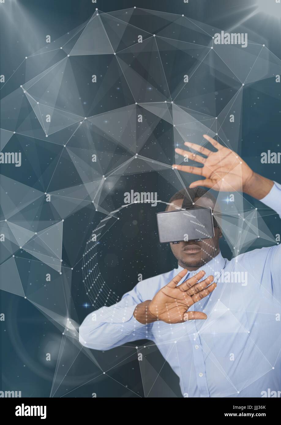 Man in VR headset touching interface against blue sky Stock Photo - Alamy