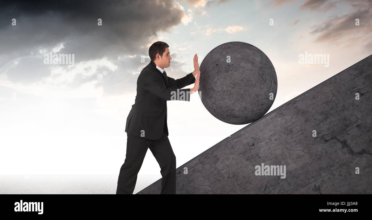 Man pushing 3D rolling round rock Stock Photo - Alamy