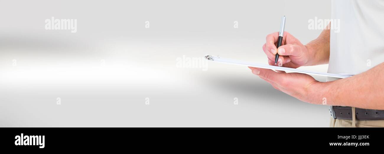 Man filling out form close up in front of blurred copy space background ...