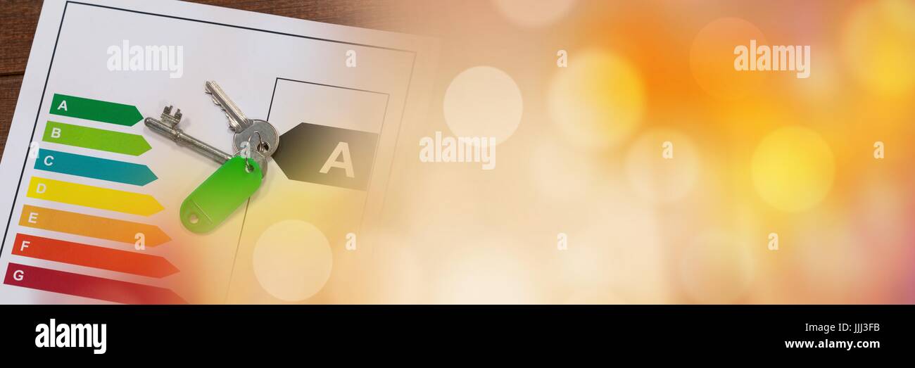 Chart and keys with orange bokeh transition Stock Photo - Alamy