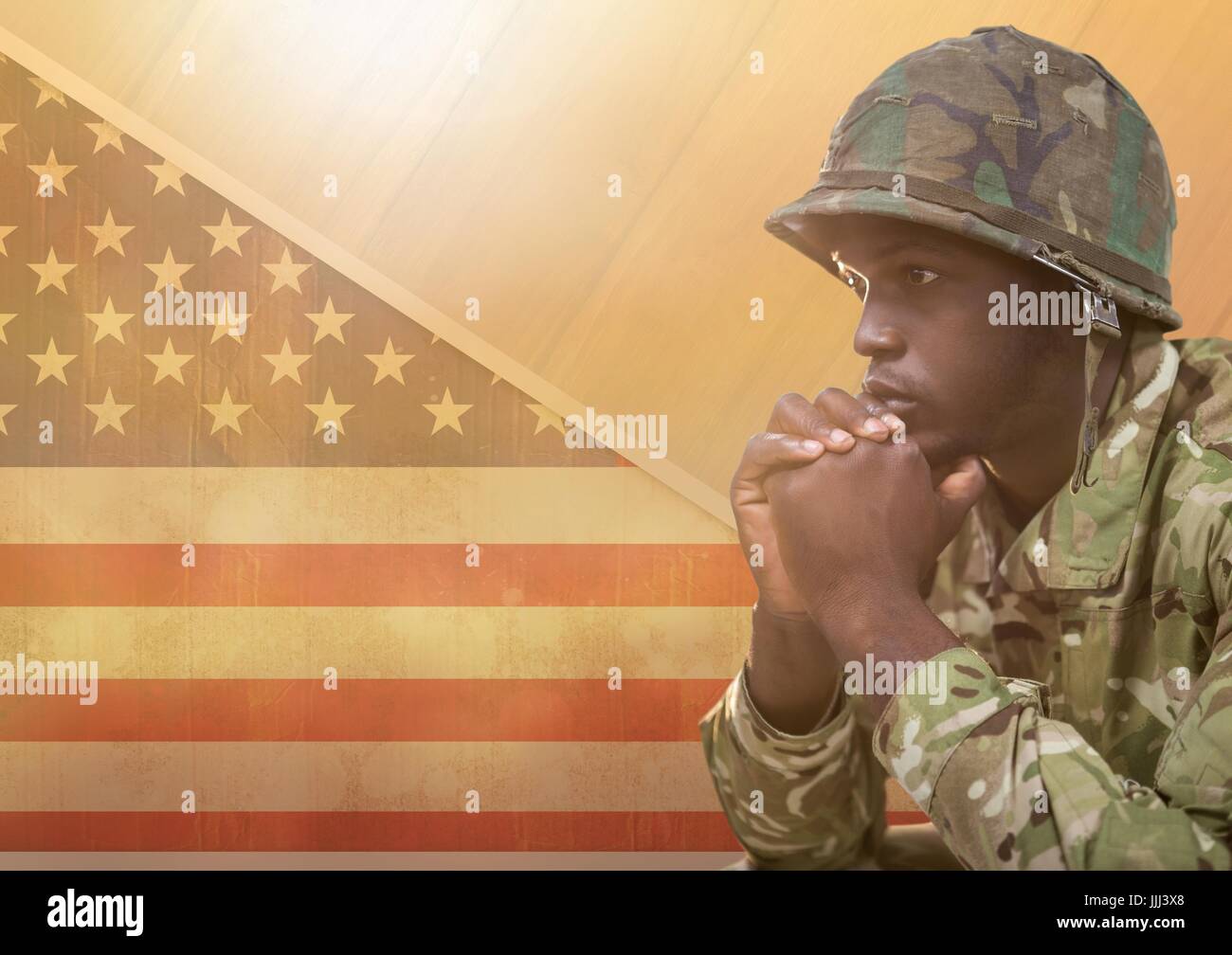 American Soldier thinking against american flag Stock Photo - Alamy
