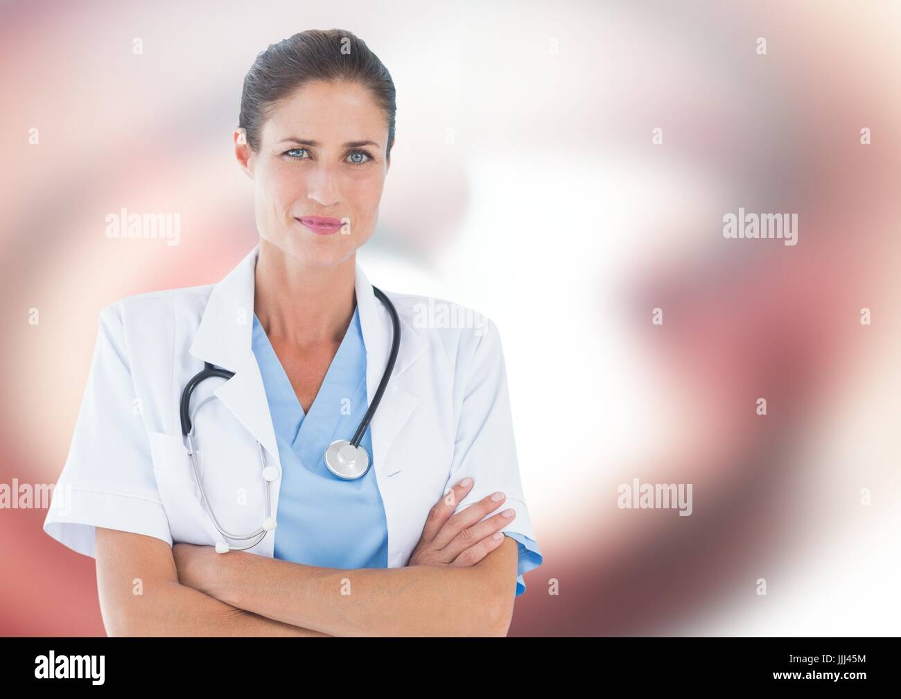 Female doctor arms folded against red and white abstract background ...