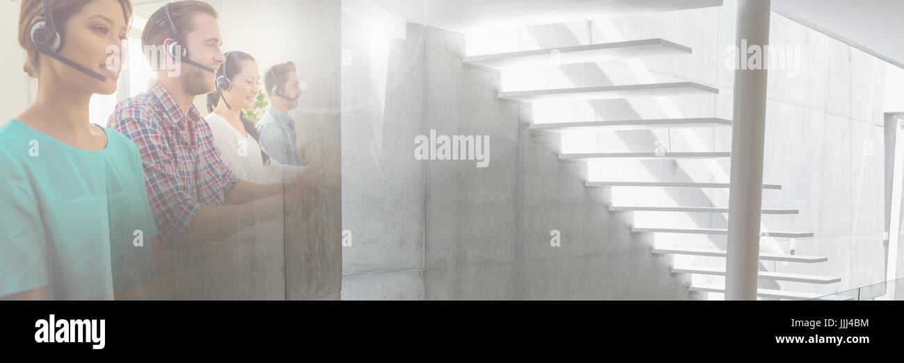 Customer service assistants with headsets with bright stairway ...
