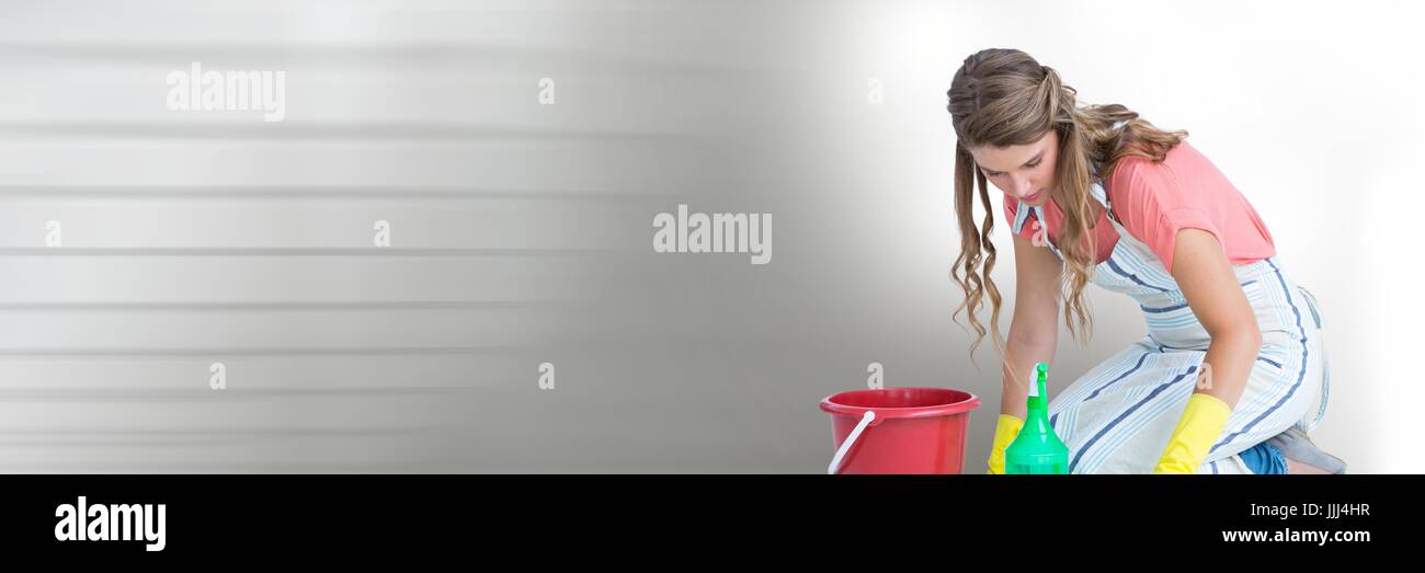 Cleaner with bucket with bright background Stock Photo - Alamy