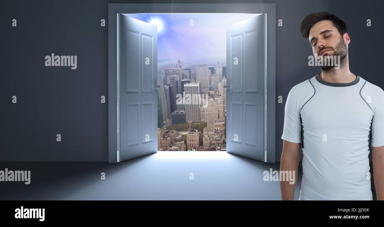 fit man by door opening into cityscape Stock Photo - Alamy