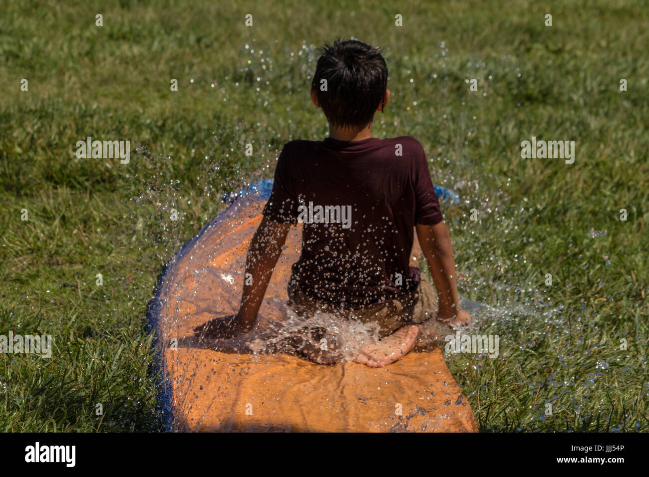 Child boy splash splashing water hi-res stock photography and images ...