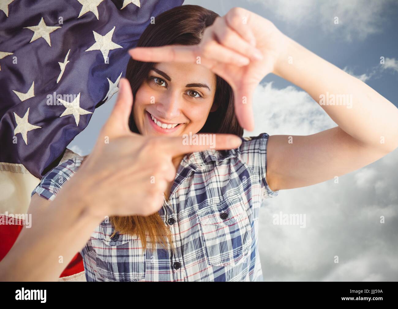 Smiling woman making a square with her hands for independence day Stock ...