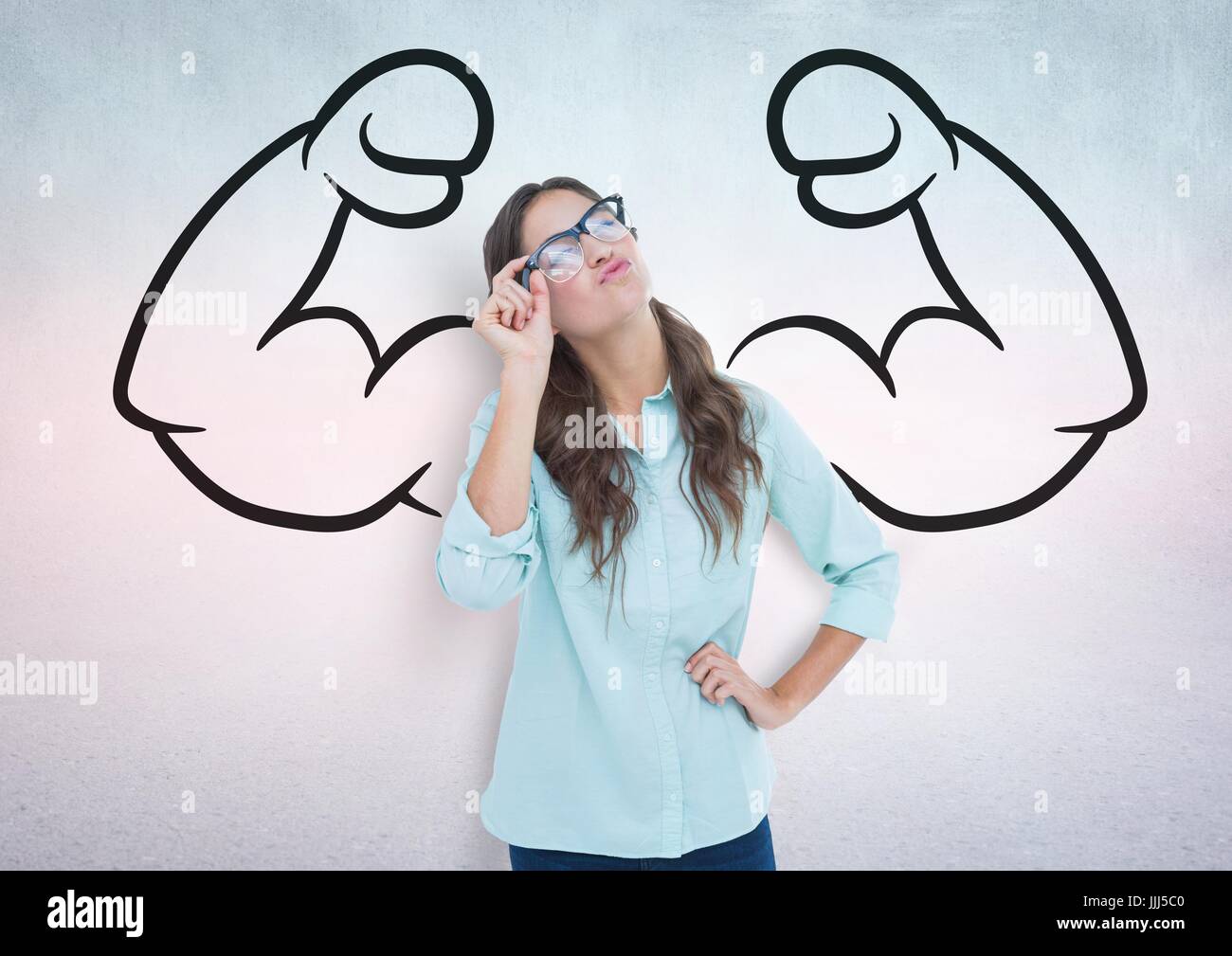 happy young woman doing foolishness in front of fists draw on the ...