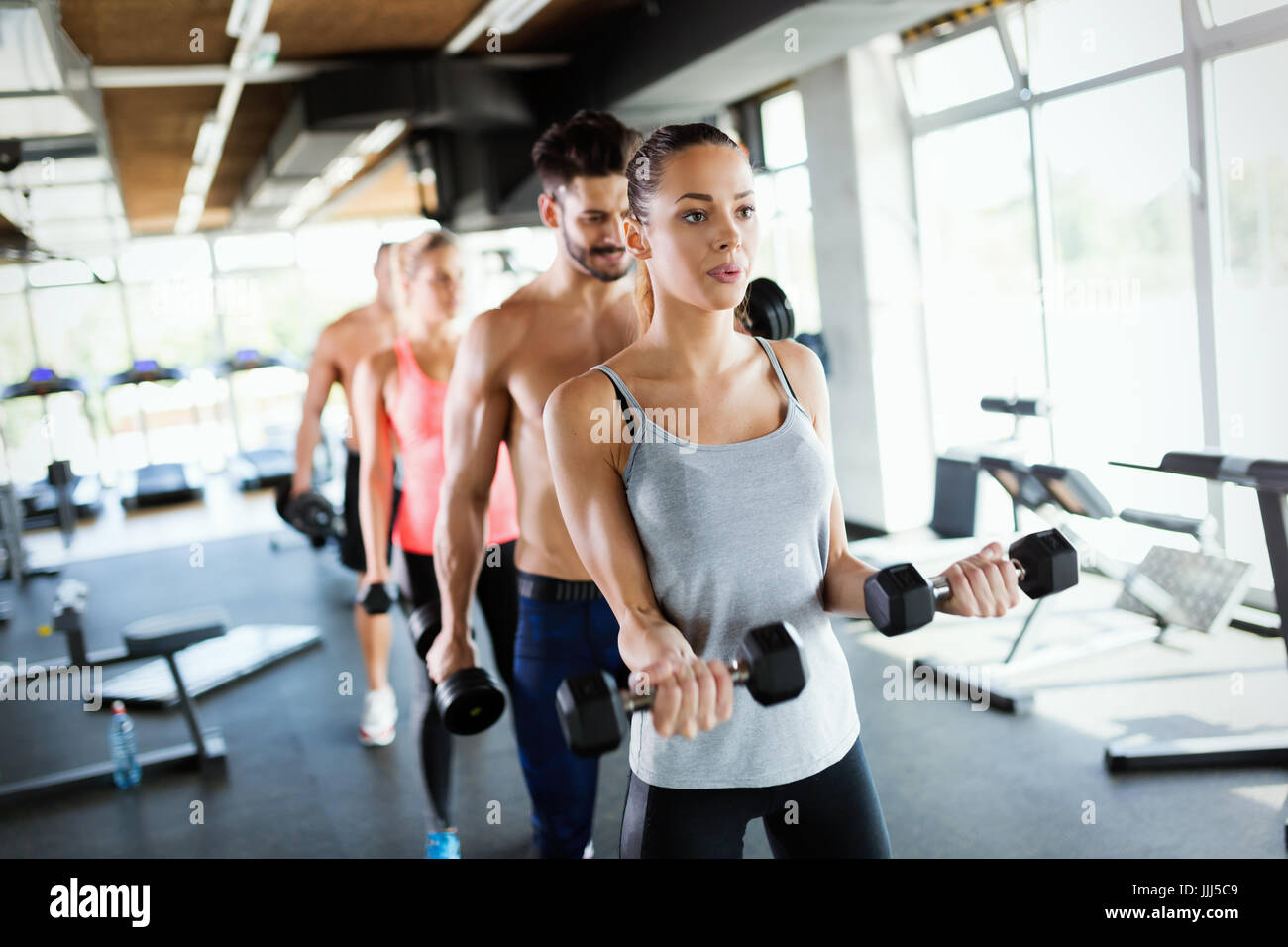 Group of people have workout in gym Stock Photo - Alamy