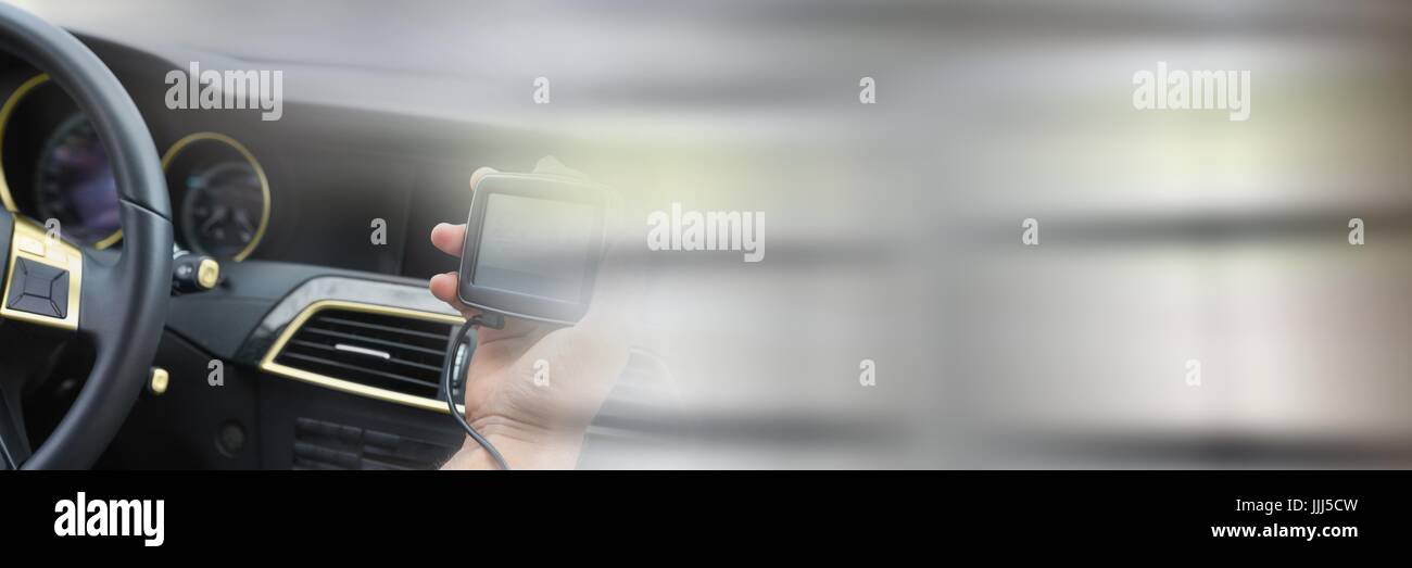 GPS and steering wheel in car with transition effect and copy space ...