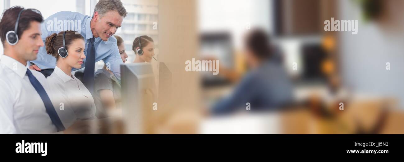 Call centre employees and blurry image of people at computer Stock ...