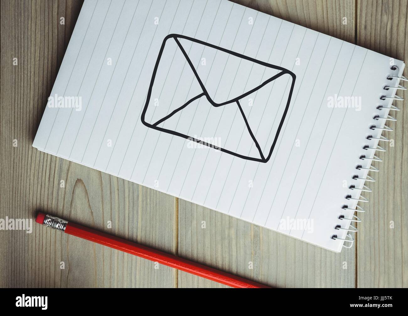 Mail doodle on notepad with red pencil Stock Photo - Alamy