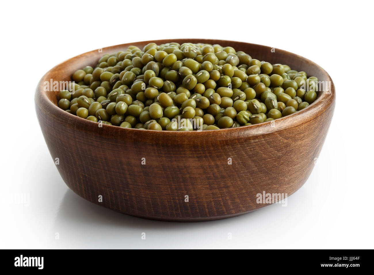Dry mung beans in dark wooden bowl isolated on white Stock Photo - Alamy