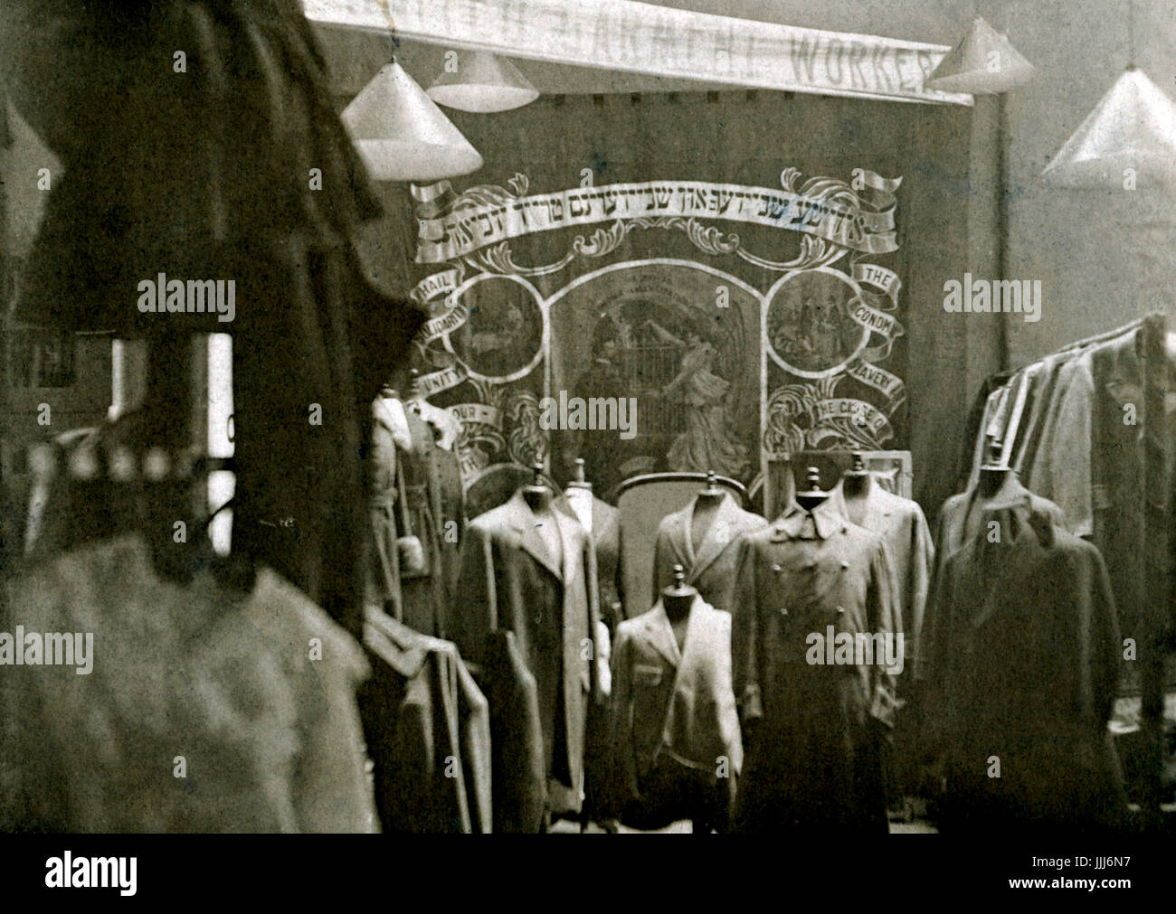 Jewish garment workers' dummies in window display. Dummies covered with ...