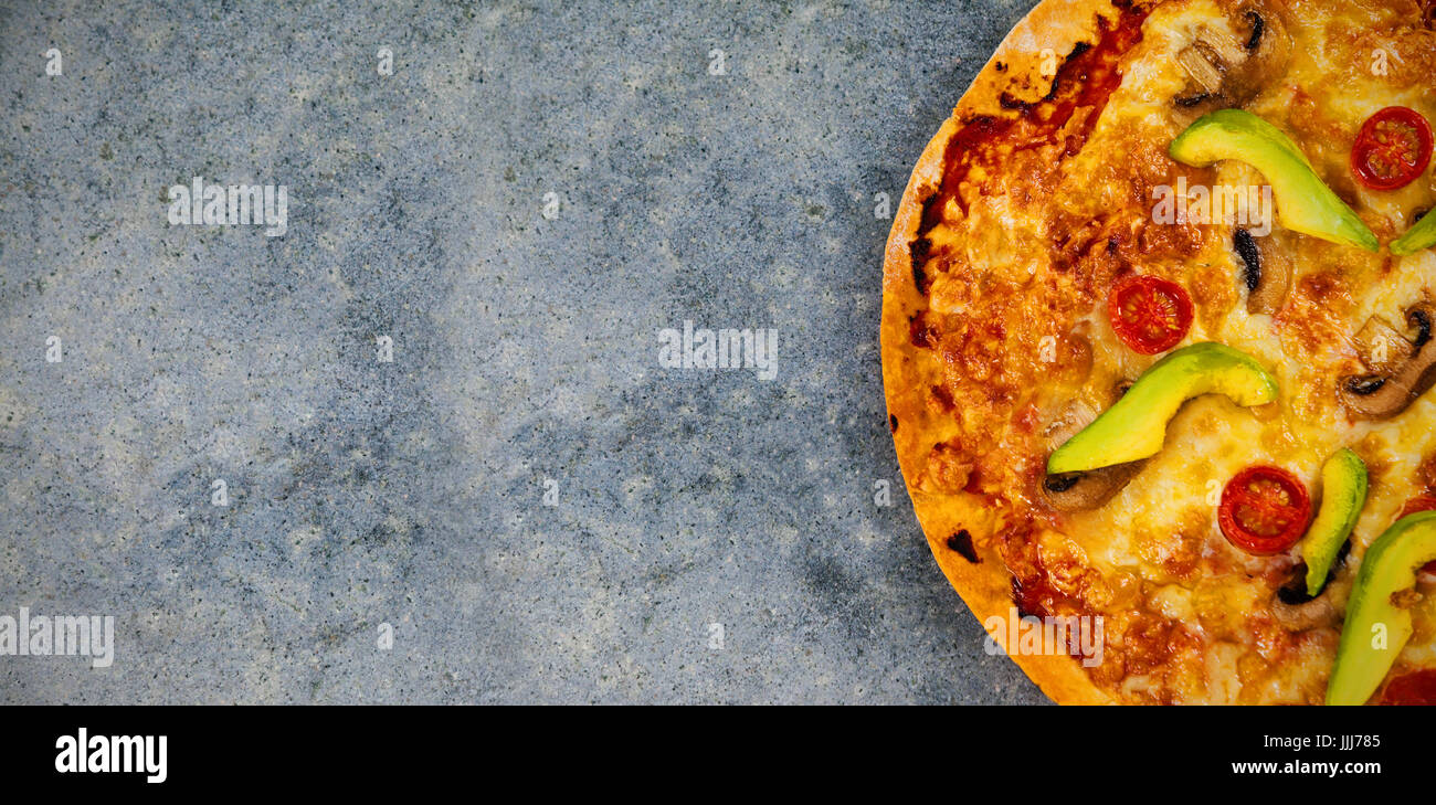 Fresh pizza on gray table Stock Photo - Alamy