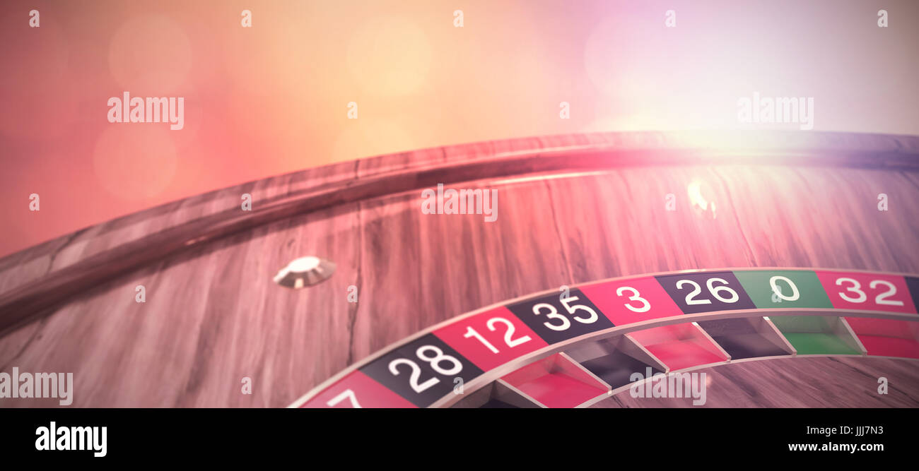 Composite image of high angle view of ball on 3d wooden roulette wheel ...