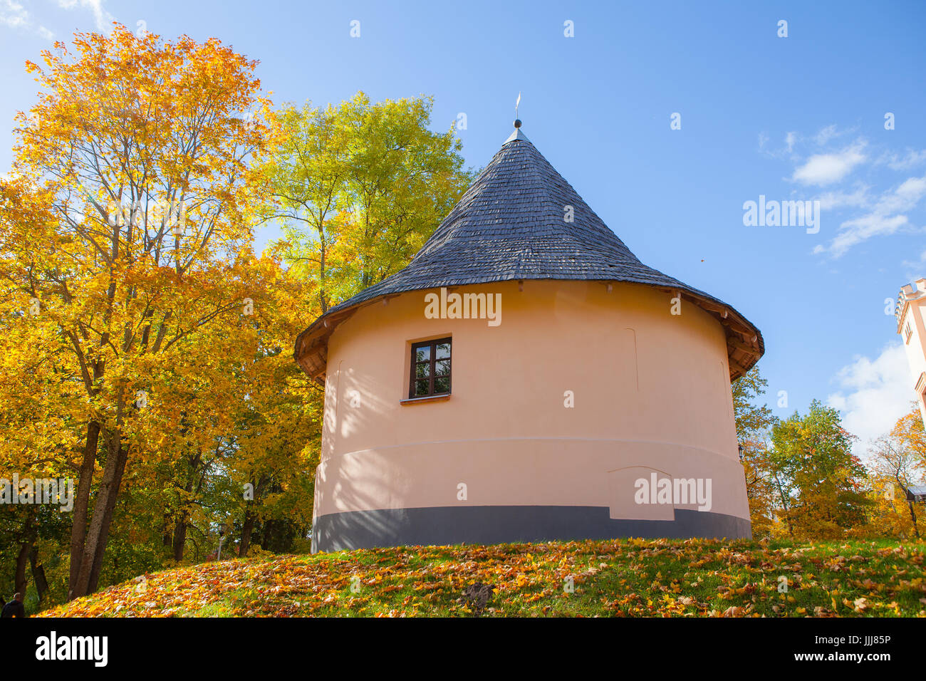 Castle tower in city park. Sunny autumn day, fall time Stock Photo - Alamy