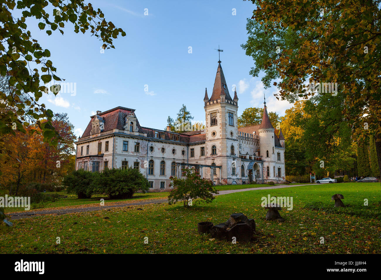 Old fairy-tale palace in Stameriena, Latvia. Fall time, bright colors ...