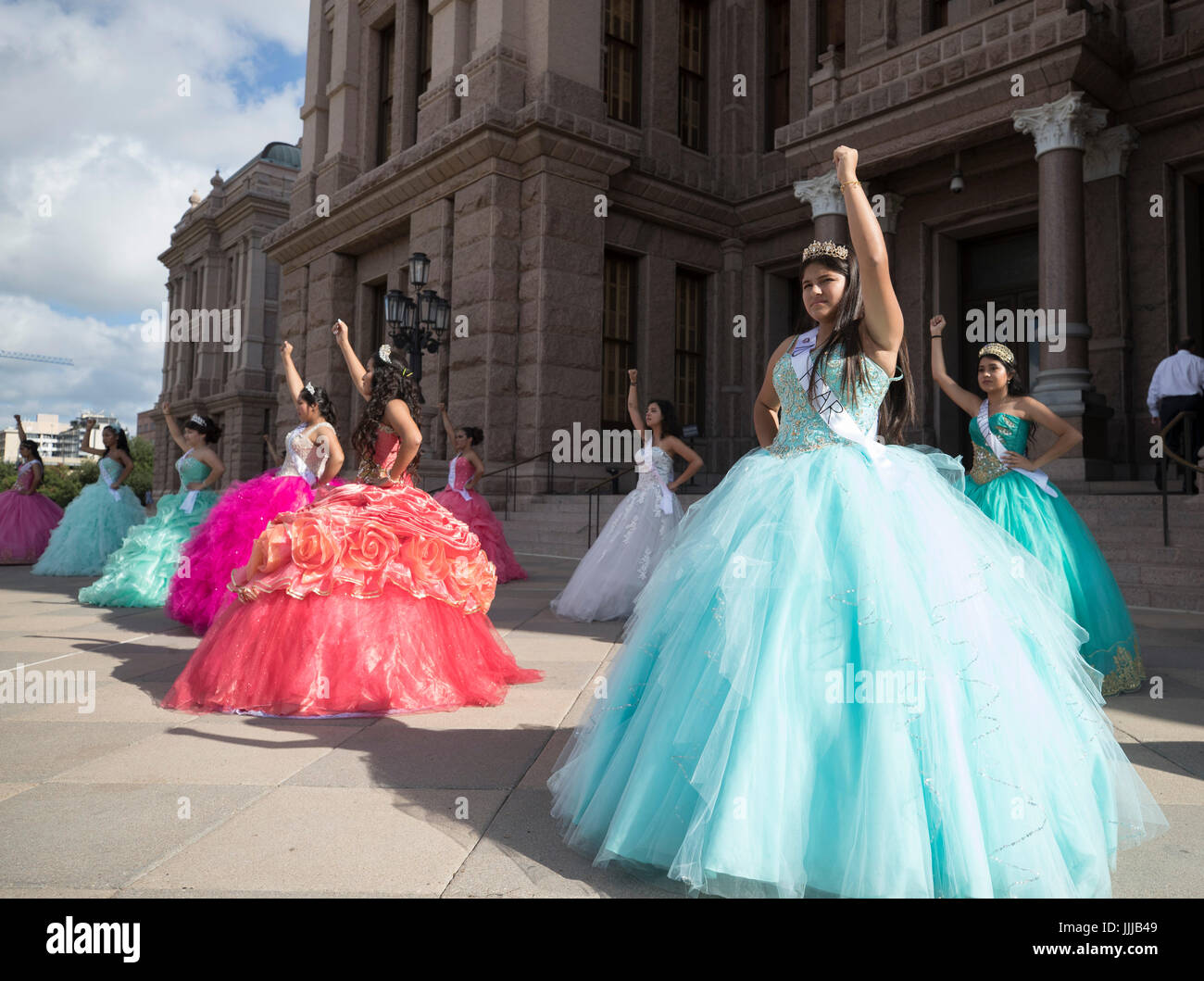 Teen girls wearing Mexican-style quinceanera dresses at the Texas ...