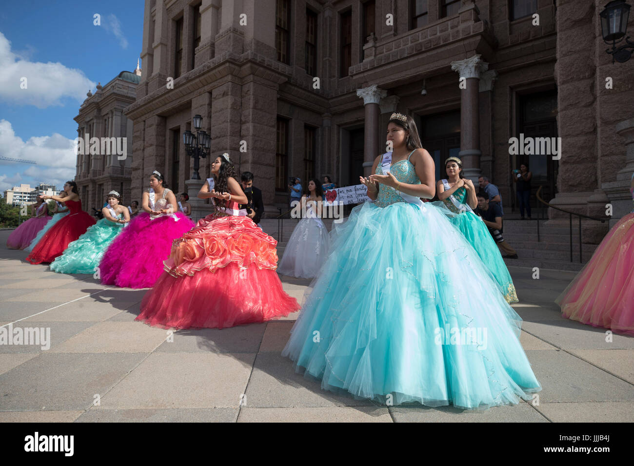 Teen girls wearing Mexican-style quinceanera dresses at the Texas ...